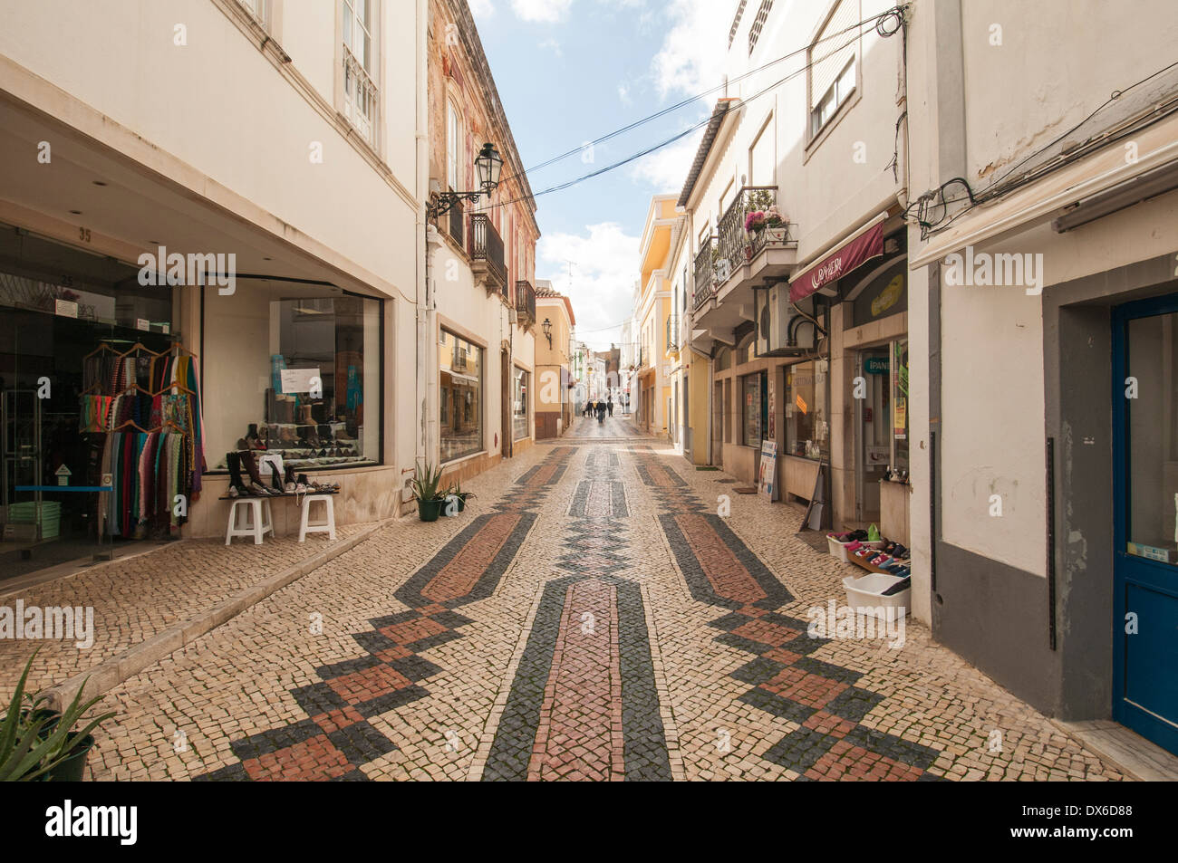 Traditional mosaic tiled street in the old town of Lagos, Portugal ...