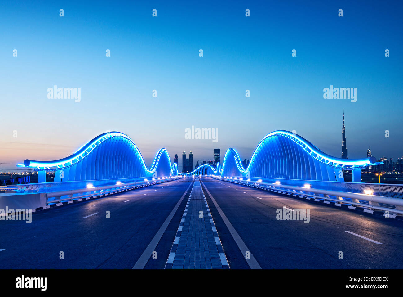 Modern architectural illuminated bridge at Meydan racecourse in Dubai ...