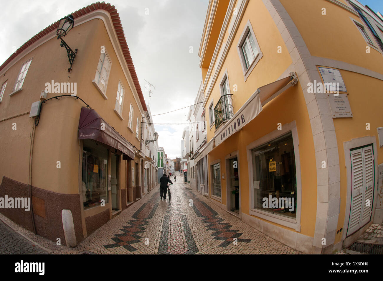Traditional mosaic tiled street in the old town of Lagos, Portugal ...