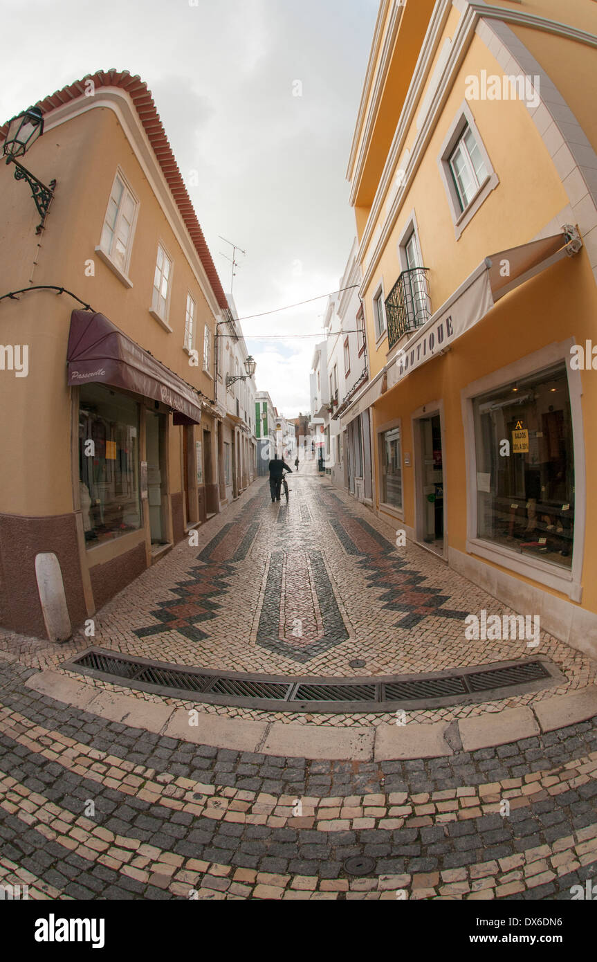 Traditional mosaic tiled street in the old town of Lagos, Portugal ...
