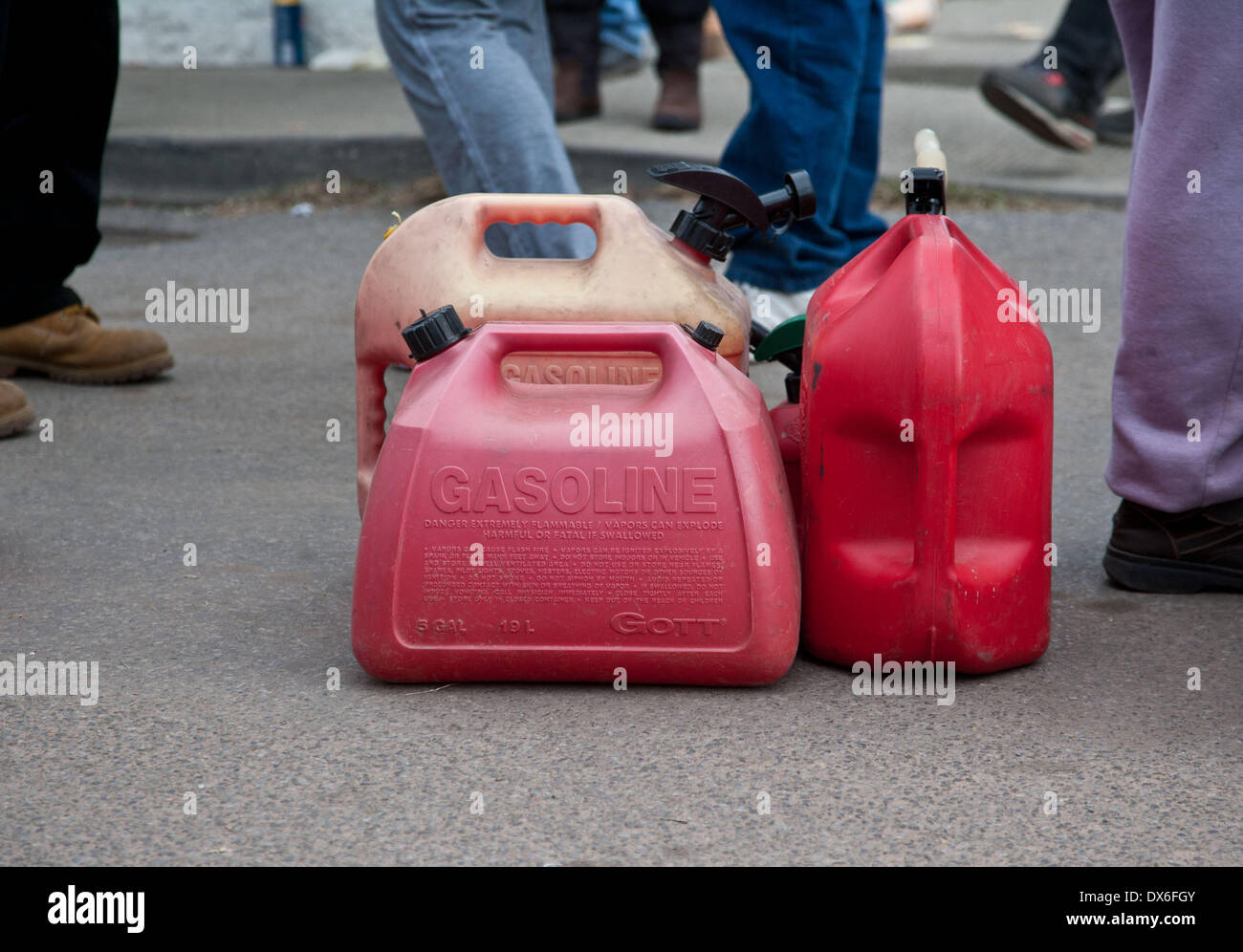 Atmosphere Police officers oversee the orderly distribution of fuel at ...