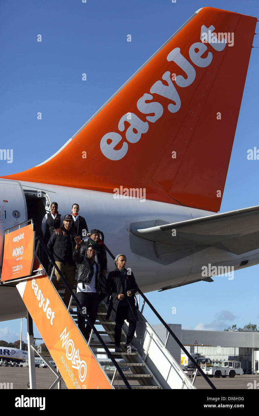 JLS arrive at Liverpool's John Lennon Airport onboard an Easyjet flight ...