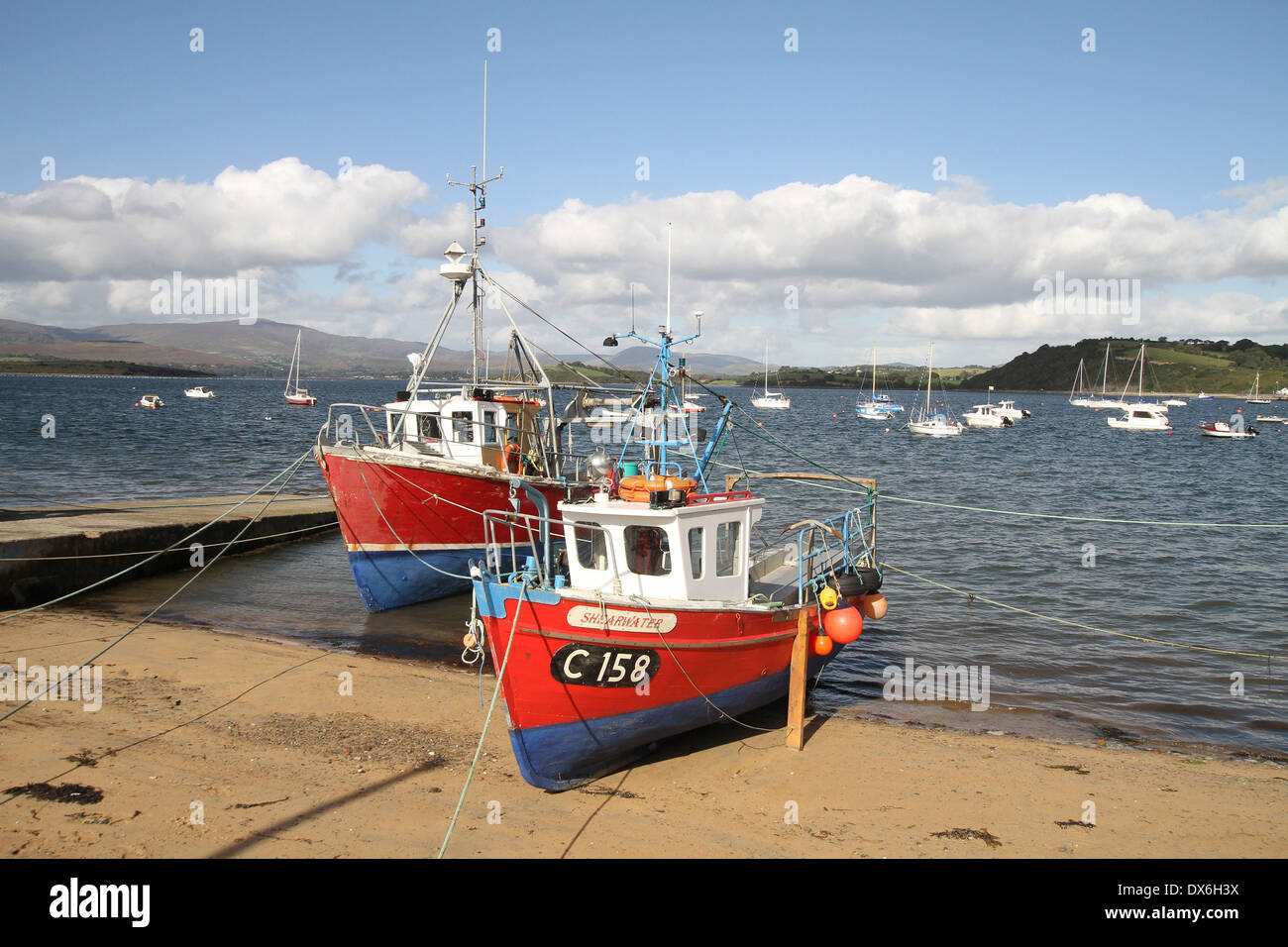 Red fishing boats hi-res stock photography and images - Alamy