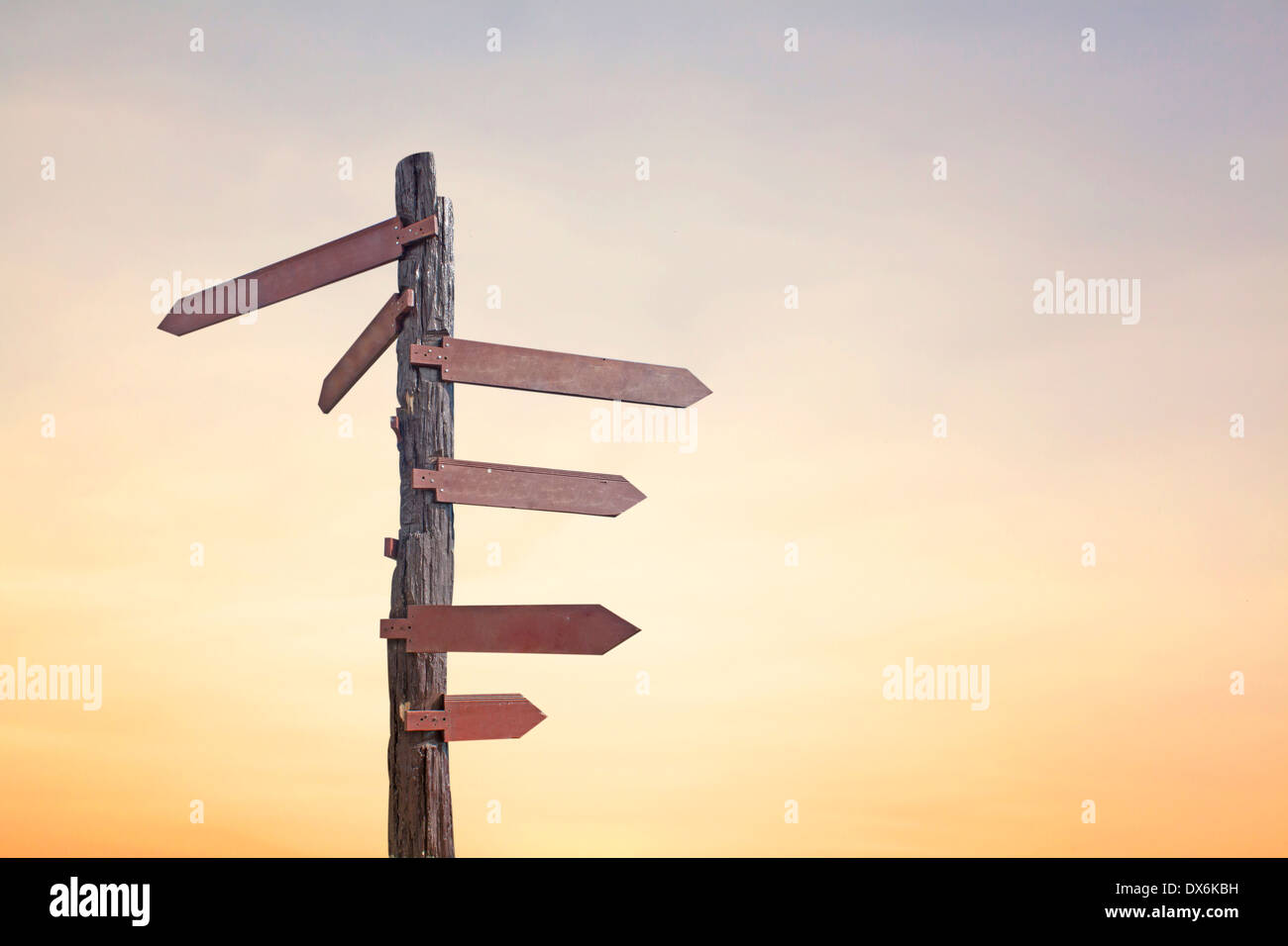 Outstanding Old Wooden sign isolated on blue sky Stock Photo - Alamy