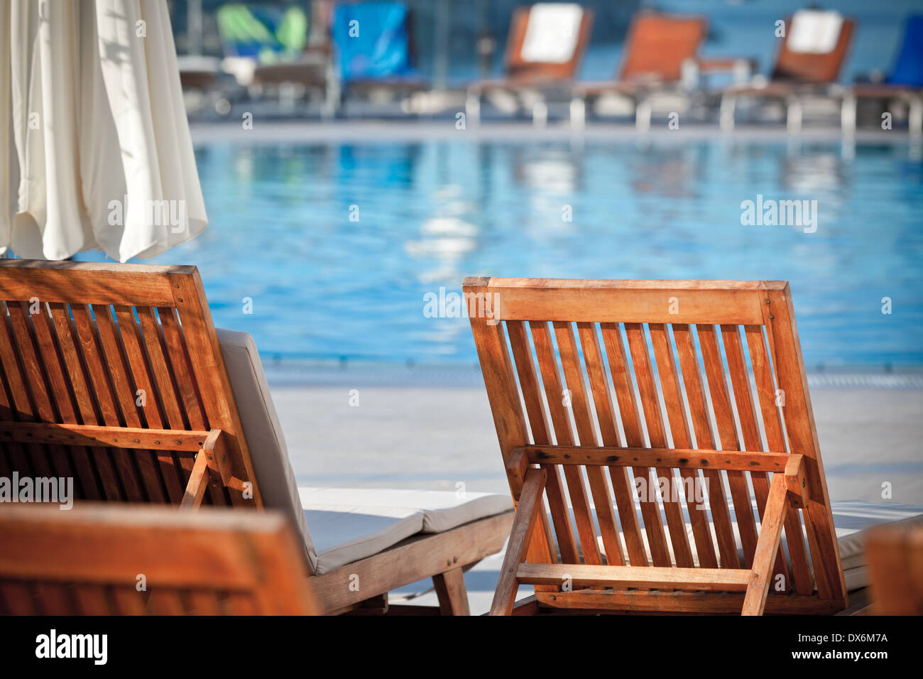 Hotel Poolside Chairs. Horizontal shot Stock Photo - Alamy