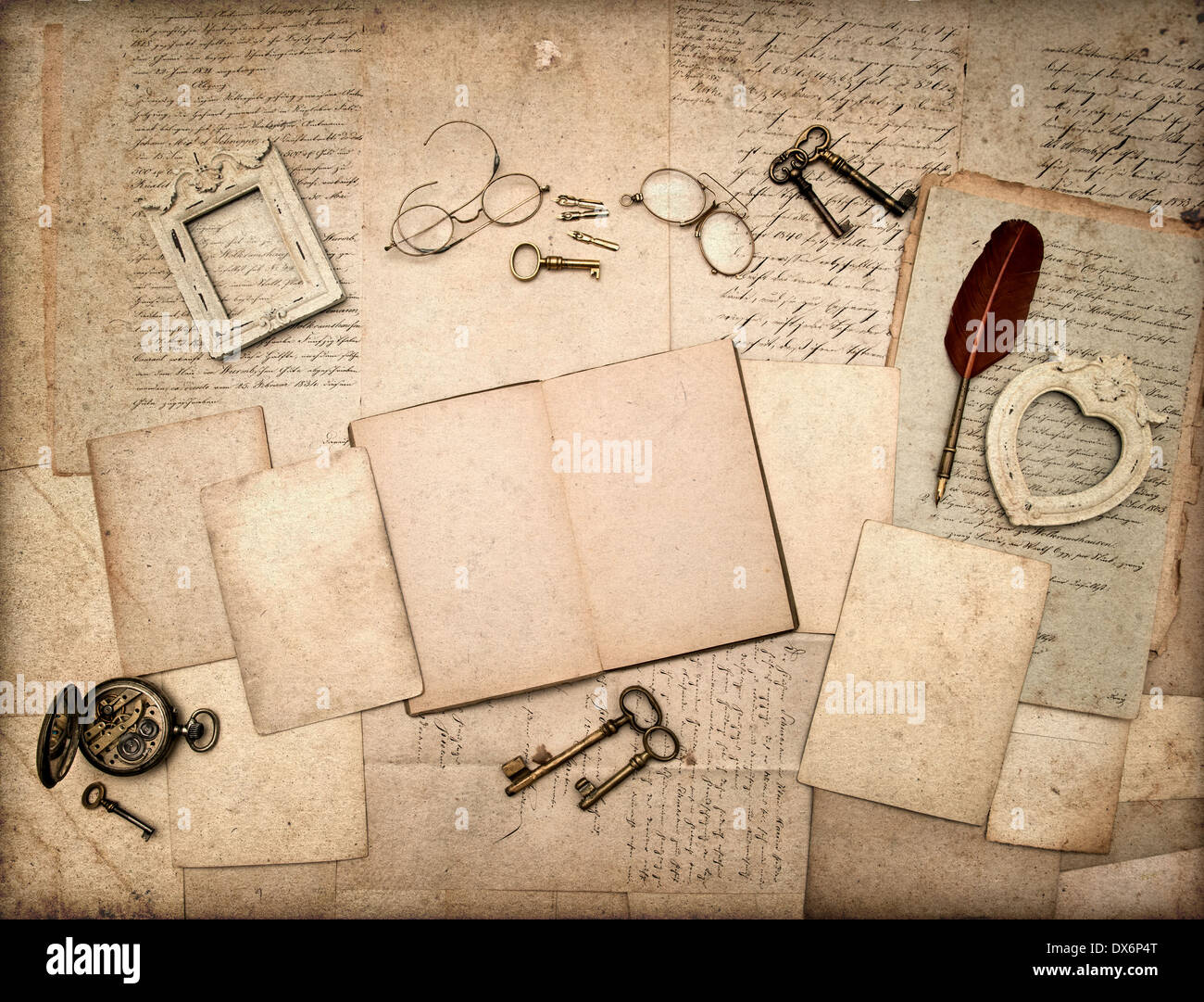 open book, vintage antique accessories and old letters. nostalgic ...