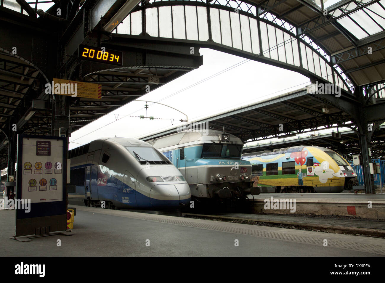 Differetnt types of trains including TGV on Gare de l'Est train station ...