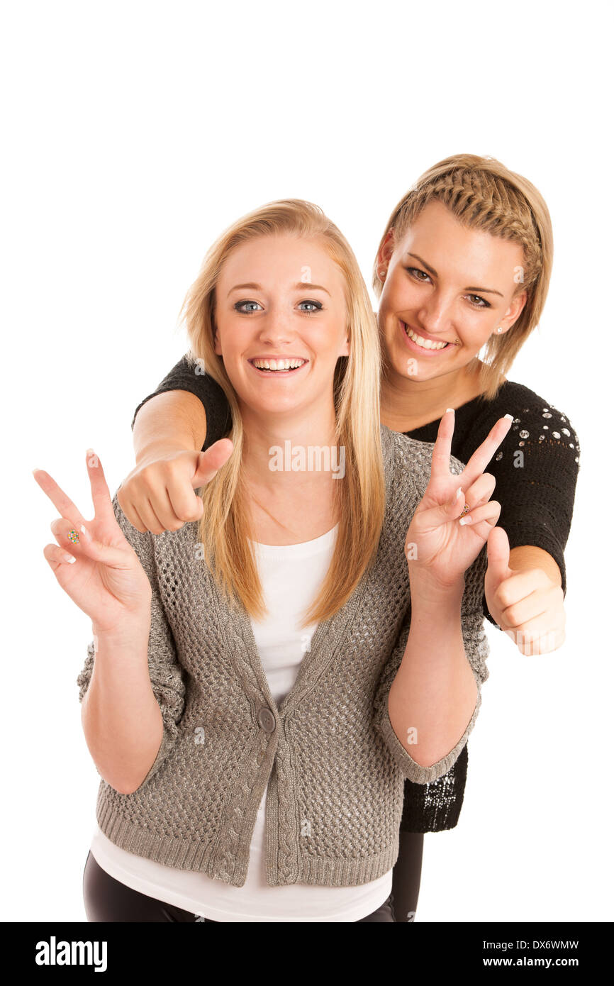 Two happy friends showing thumb up Stock Photo - Alamy