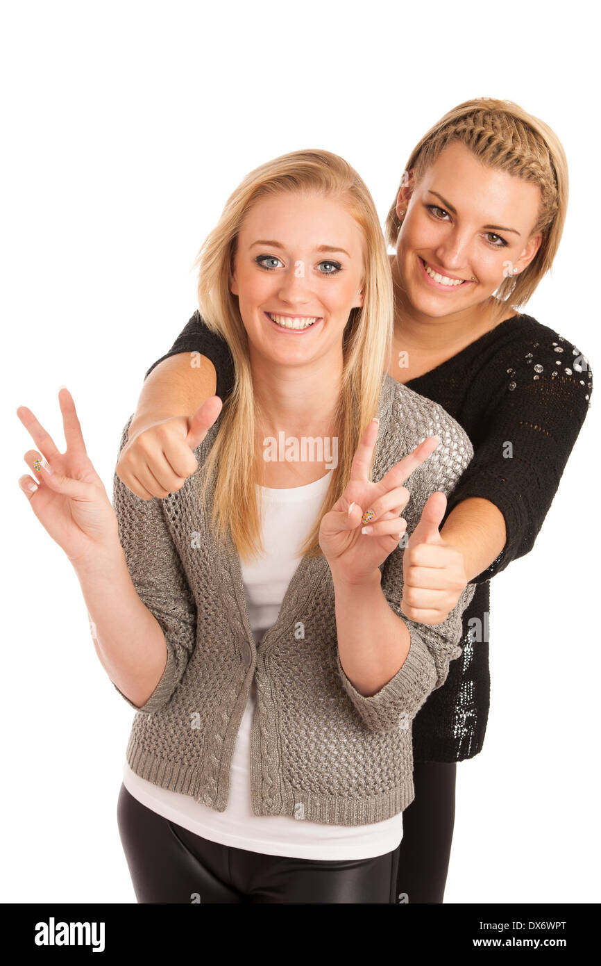 Two happy friends showing thumb up Stock Photo - Alamy