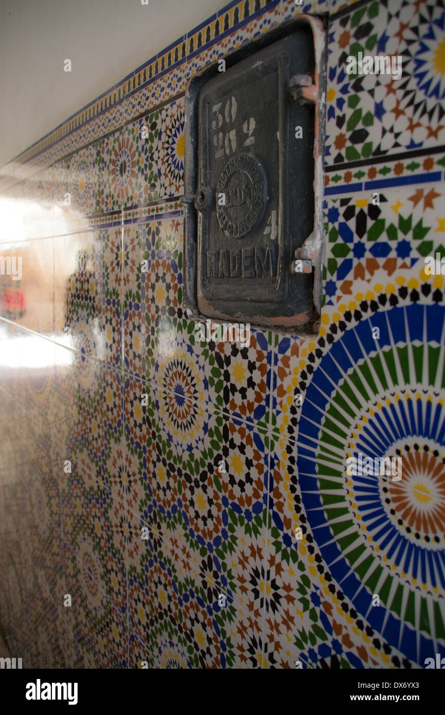 A tiled walkway decorated in traditional Moroccan style mosaic design ...