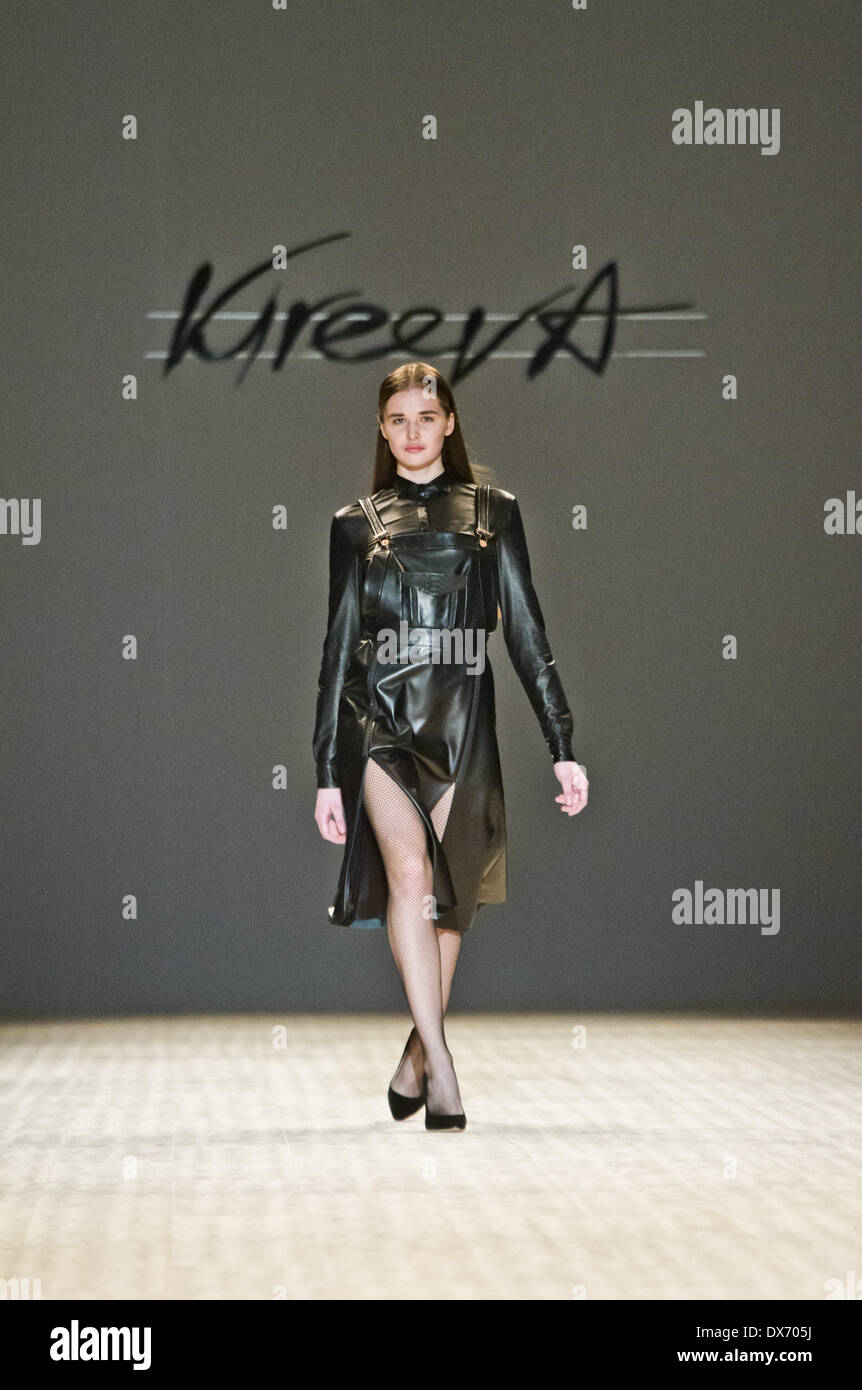 Kiev, Ukraine. 18th Mar, 2014. A model presents a creation by Ukrainian ...