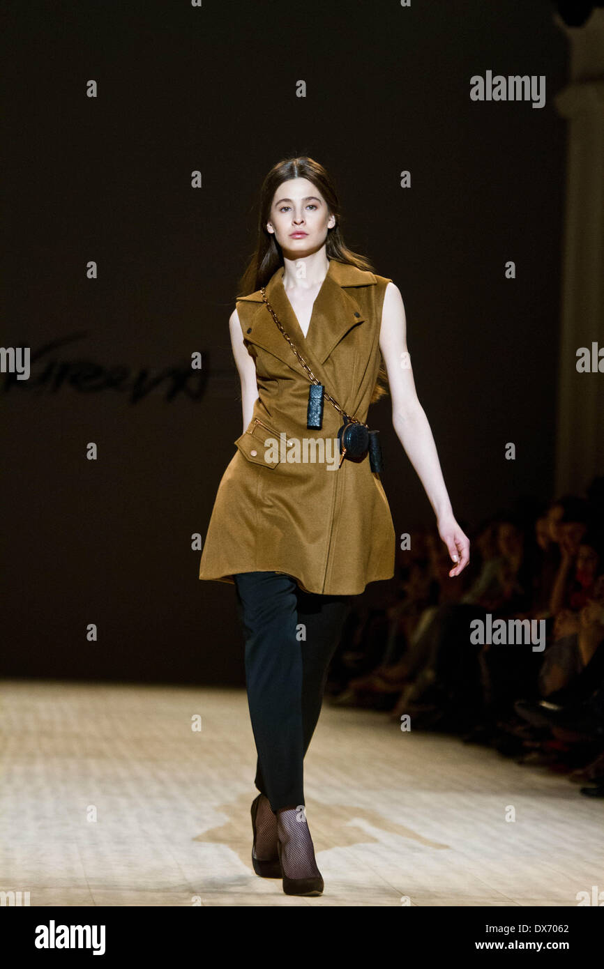 Model presents creation designer ksenia hi-res stock photography and ...