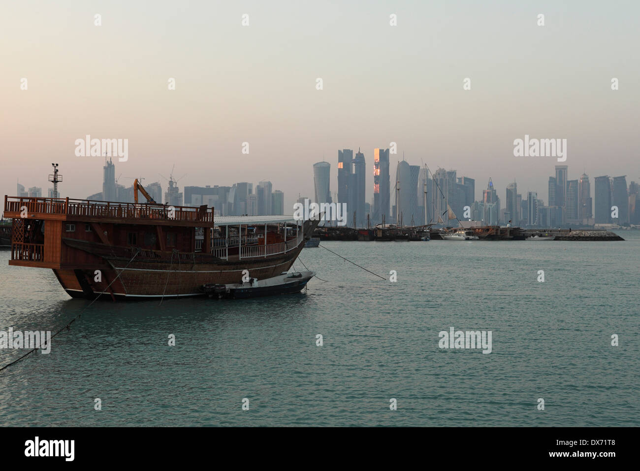 A traditional wooden boat in the Corniche marina at Doha, Qatar Stock ...