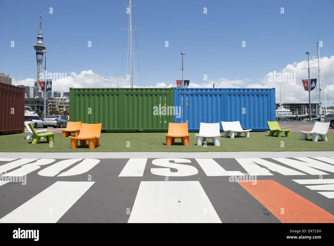 Colourful seats and shipping containers used to make a seating area in ...