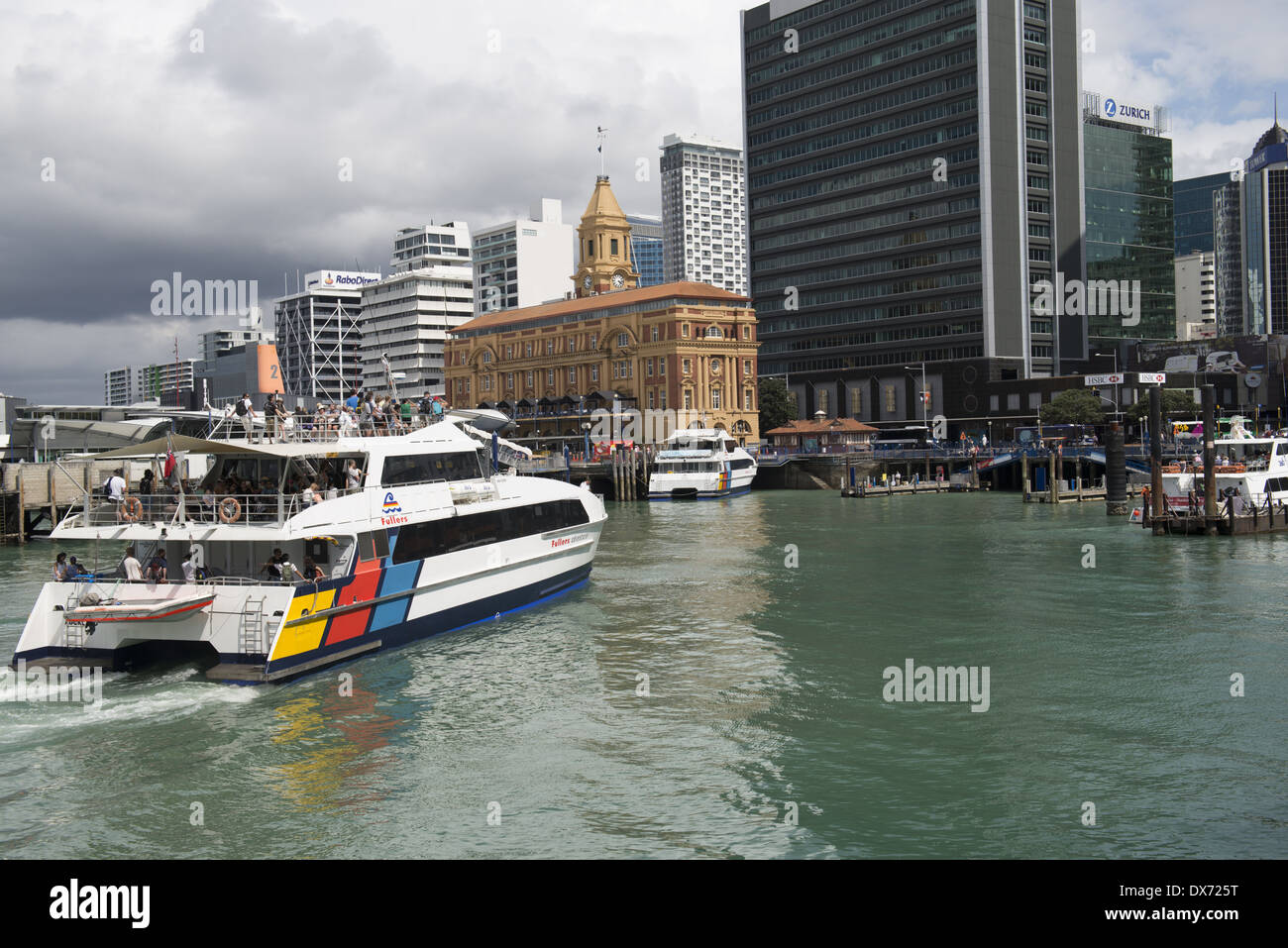 A Harbour Ferry arriving at the ferry terminal in front of the Ferry ...