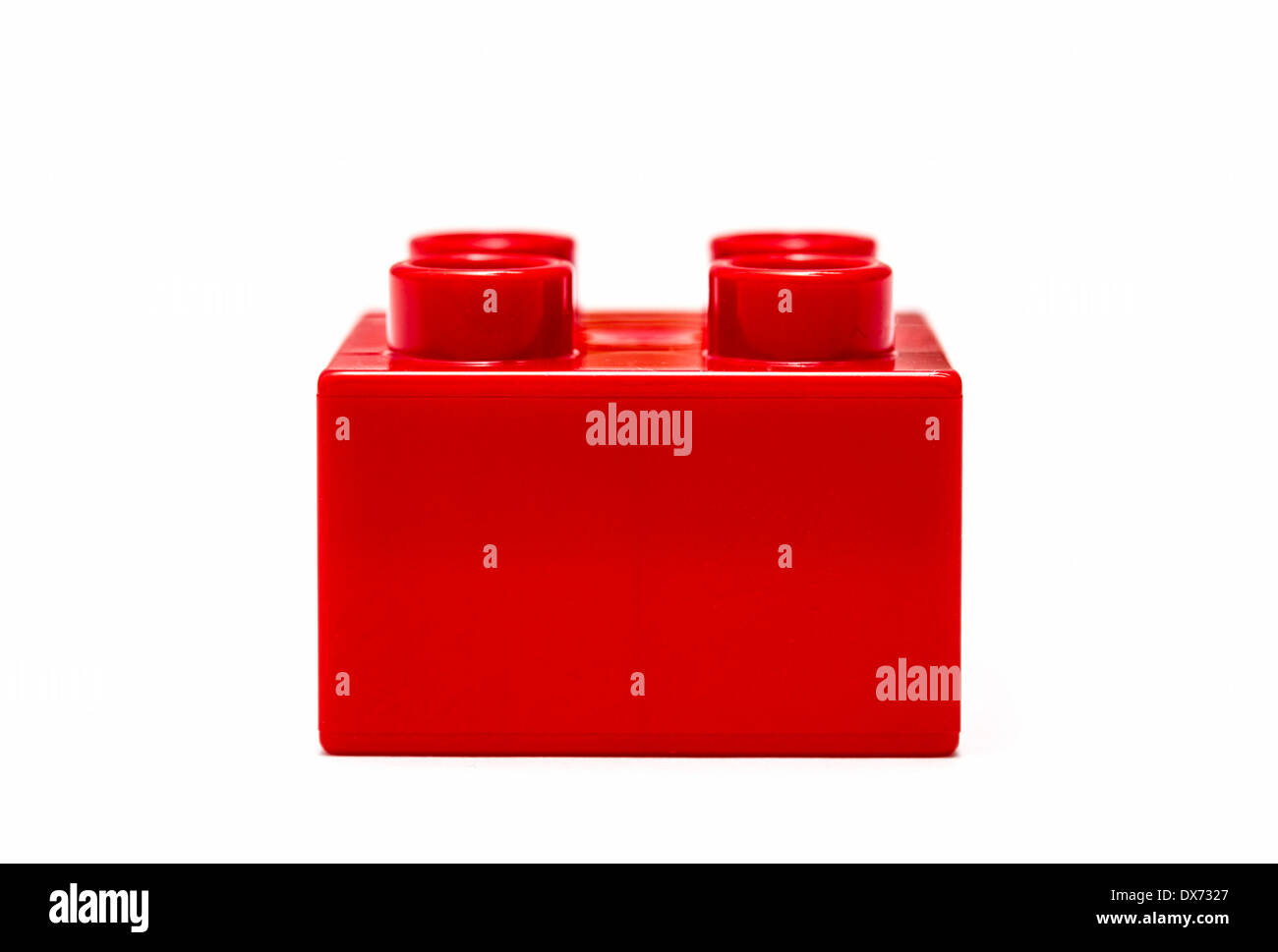 Red building blocks closeup on white background Stock Photo - Alamy