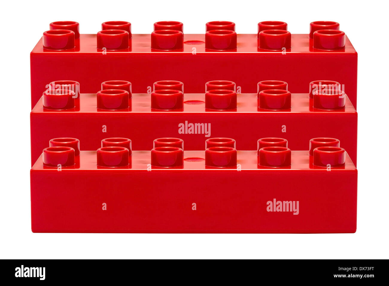 Red building block closeup on white background Stock Photo - Alamy