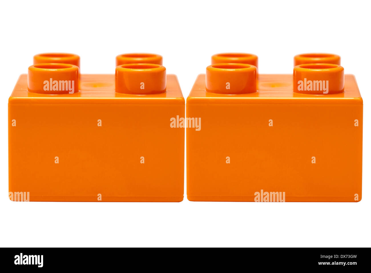 Yellow building block isolated on white Stock Photo - Alamy