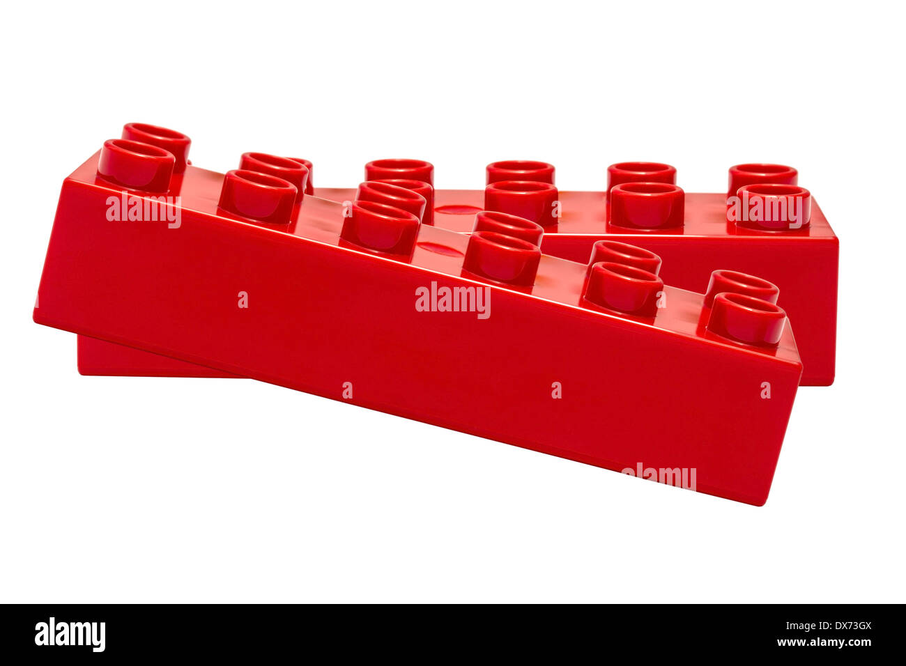 Red building block closeup on white background Stock Photo - Alamy