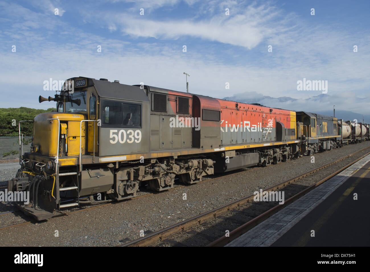 A goods train passing through Kaikoura station Stock Photo - Alamy