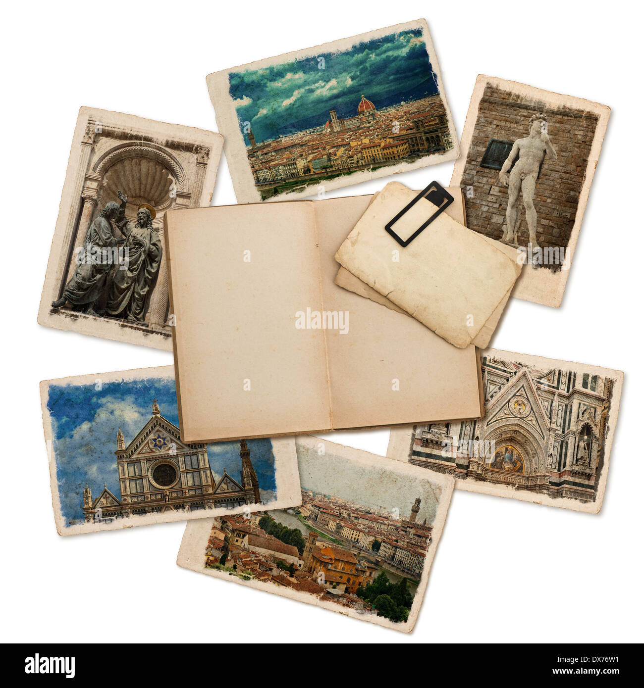 open old book with retro designed postcards isolated on white ...