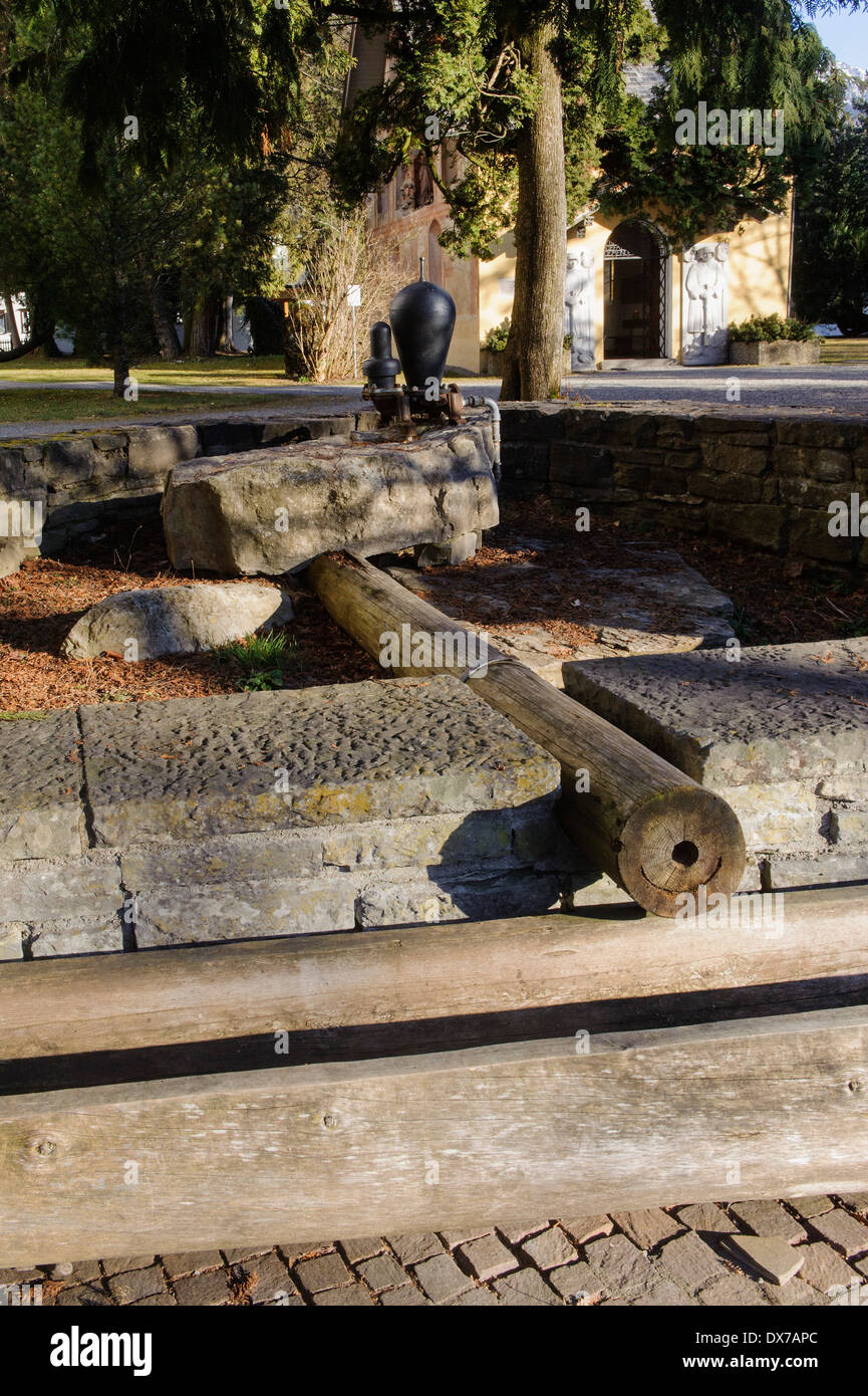 traditional wooden water pipe and pump in Oberstdorf, Allgäu, Bavaria ...