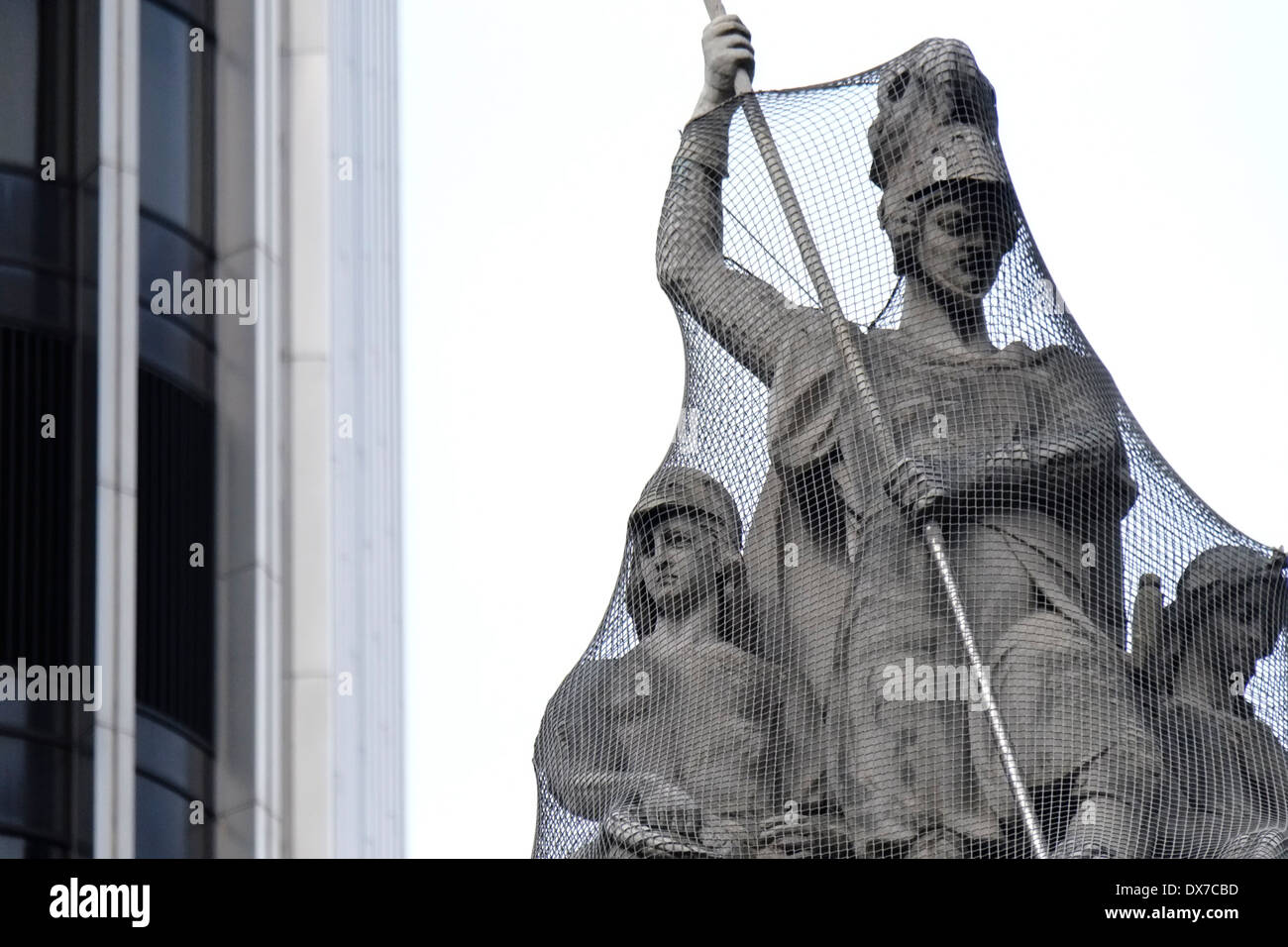 Statue under Netting Stock Photo - Alamy