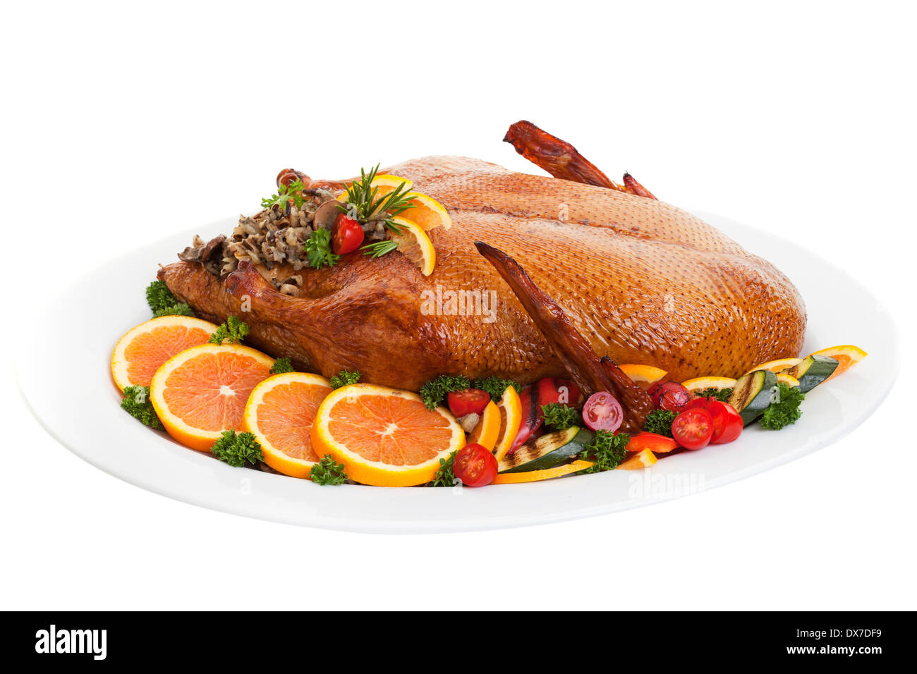 Roasted duck on a plate with salads oranges and vegetables,on a white ...