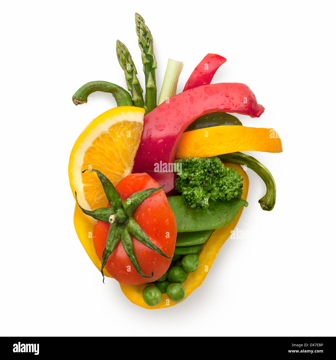 A healthy human heart made of fruits and vegetables as a food concept ...