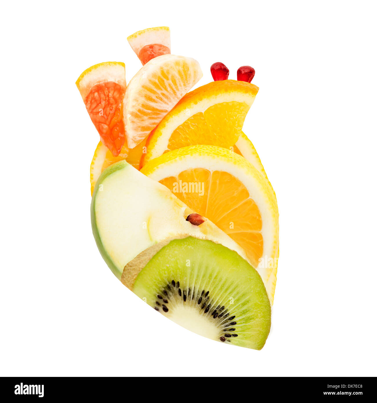 A food concept of a human heart made of fruits, isolated on white Stock ...