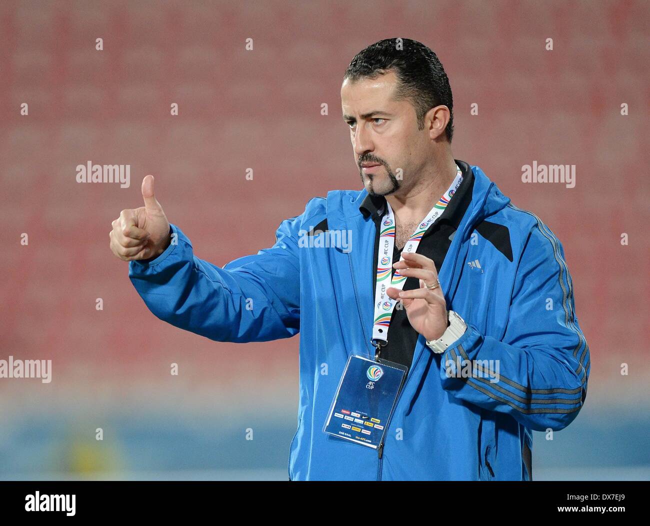 Kuwait City, Kuwait. 19th Mar, 2014. Syria's Al Jaish SC Coach Mohammed ...