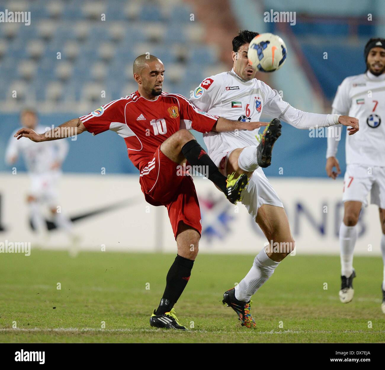 Kuwait City, Kuwait. 19th Mar, 2014. Javad Nekonam (R) of Kuwait's AL ...