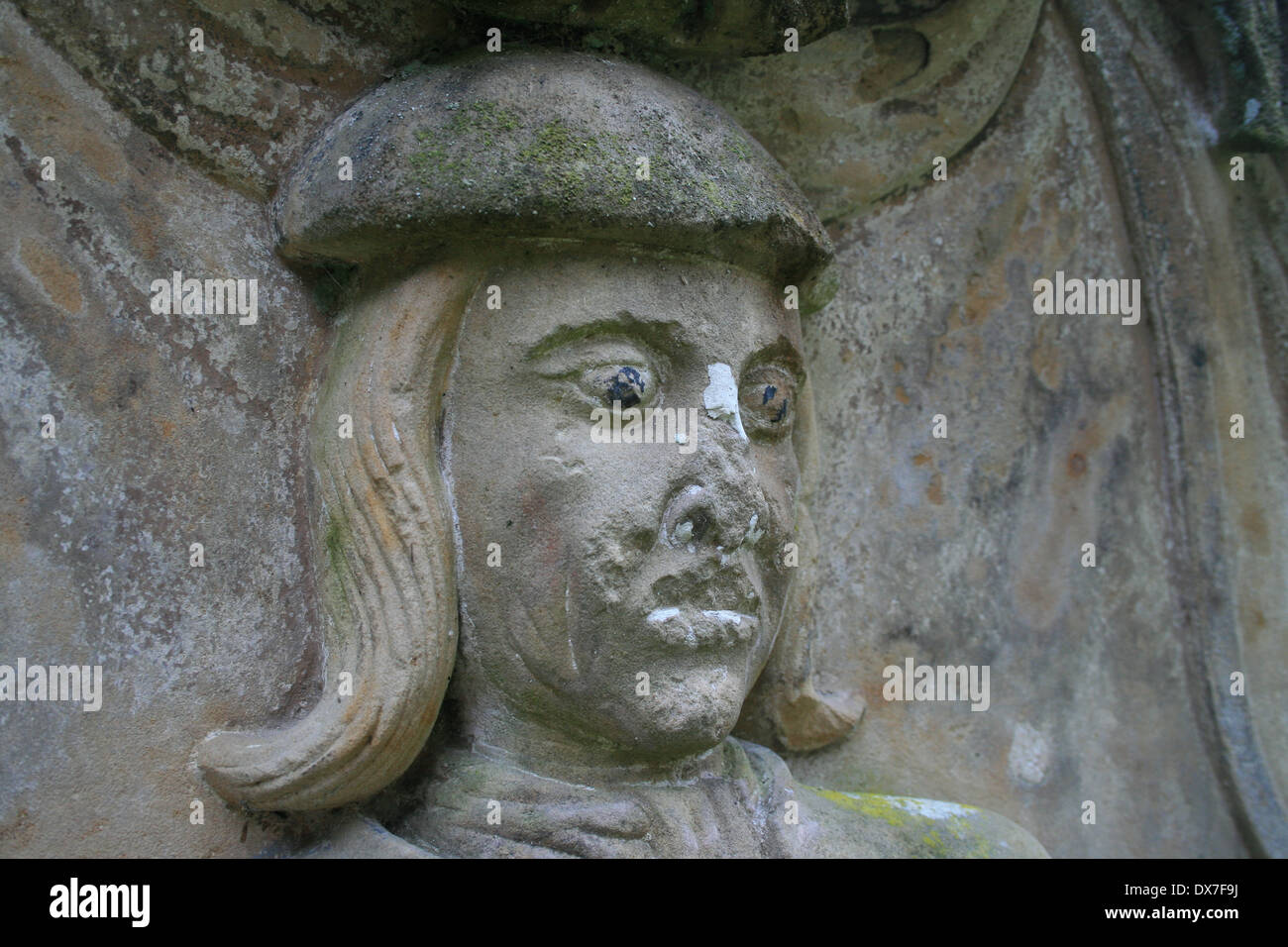Stone head on Gravestone Stock Photo - Alamy