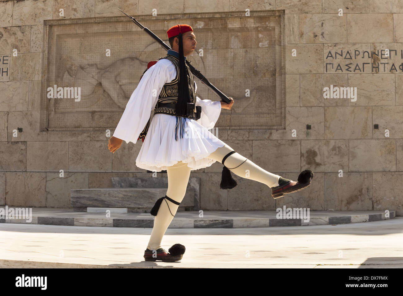 Greek soldier, Evzone, marching beside Tomb of the Unknown Soldier ...