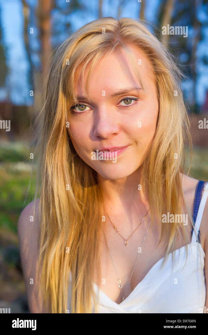 Beautiful young blond smiling hi-res stock photography and images - Alamy