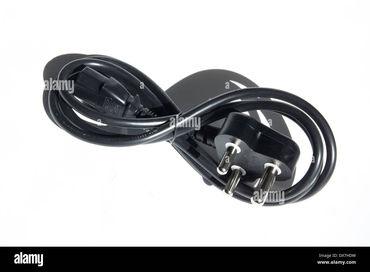 isolated new three pronged black power cable Stock Photo - Alamy