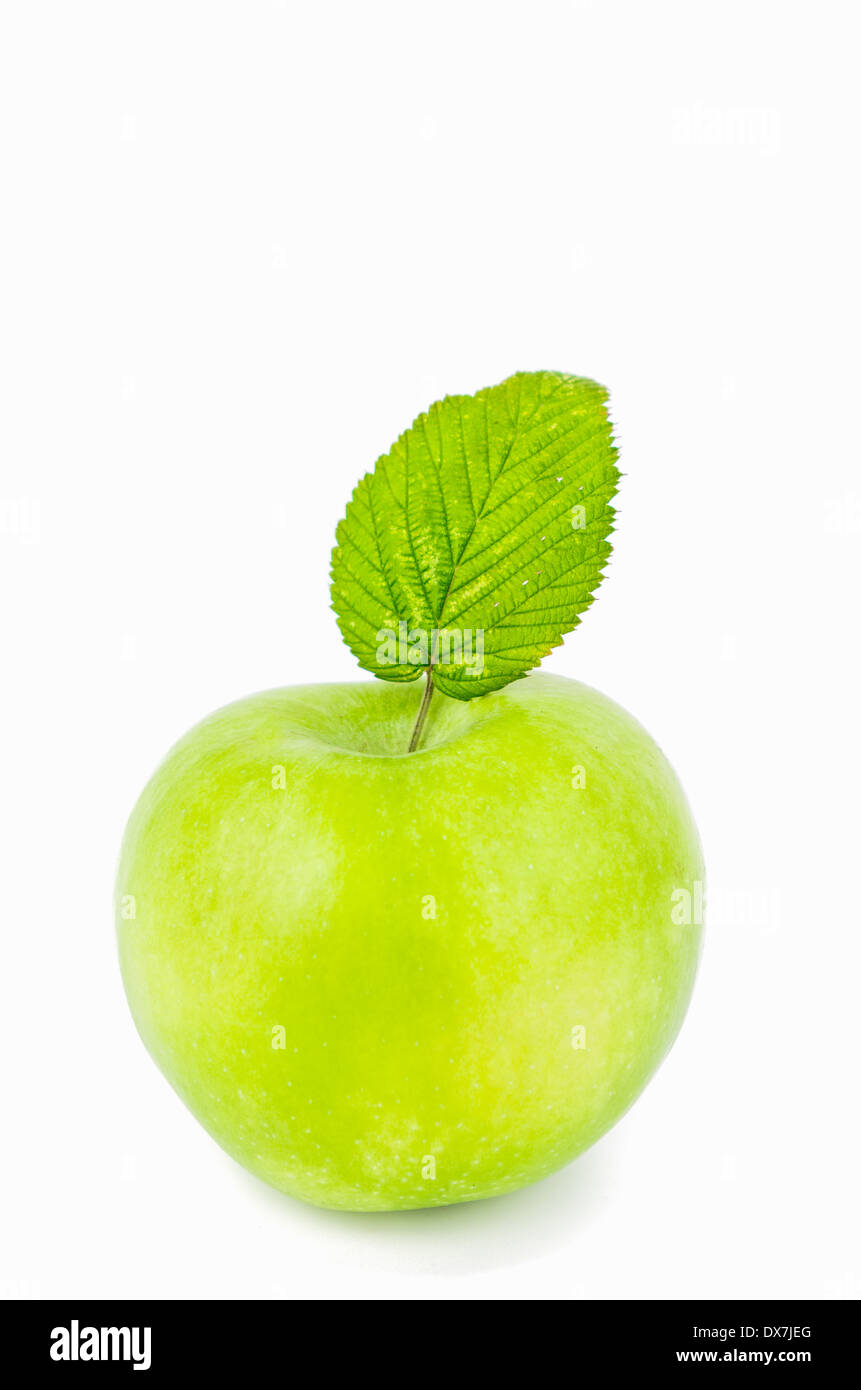 green apple on a white background isolated Stock Photo - Alamy