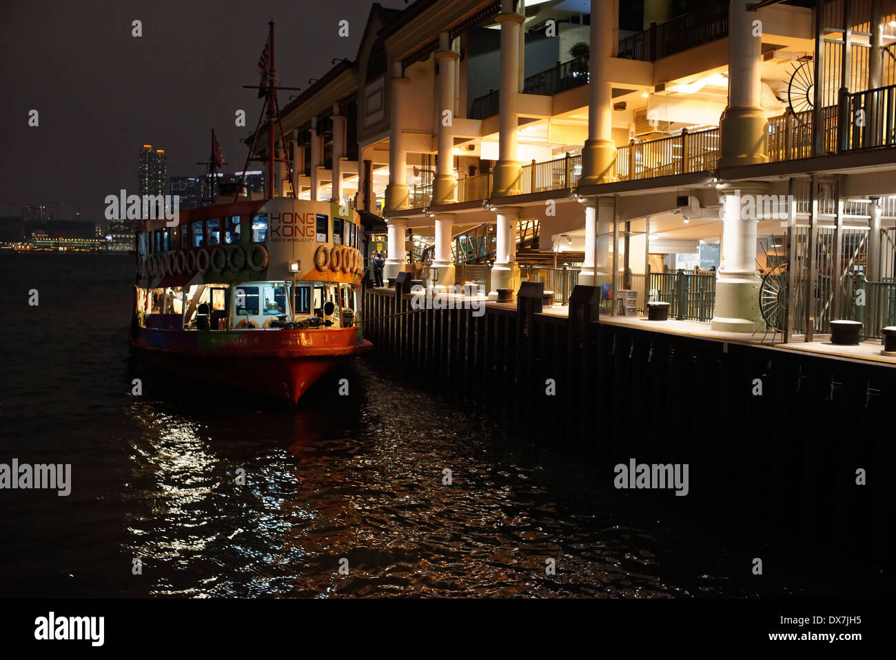 Hong Kong Victoria Harbour Star ferry at night Stock Photo - Alamy