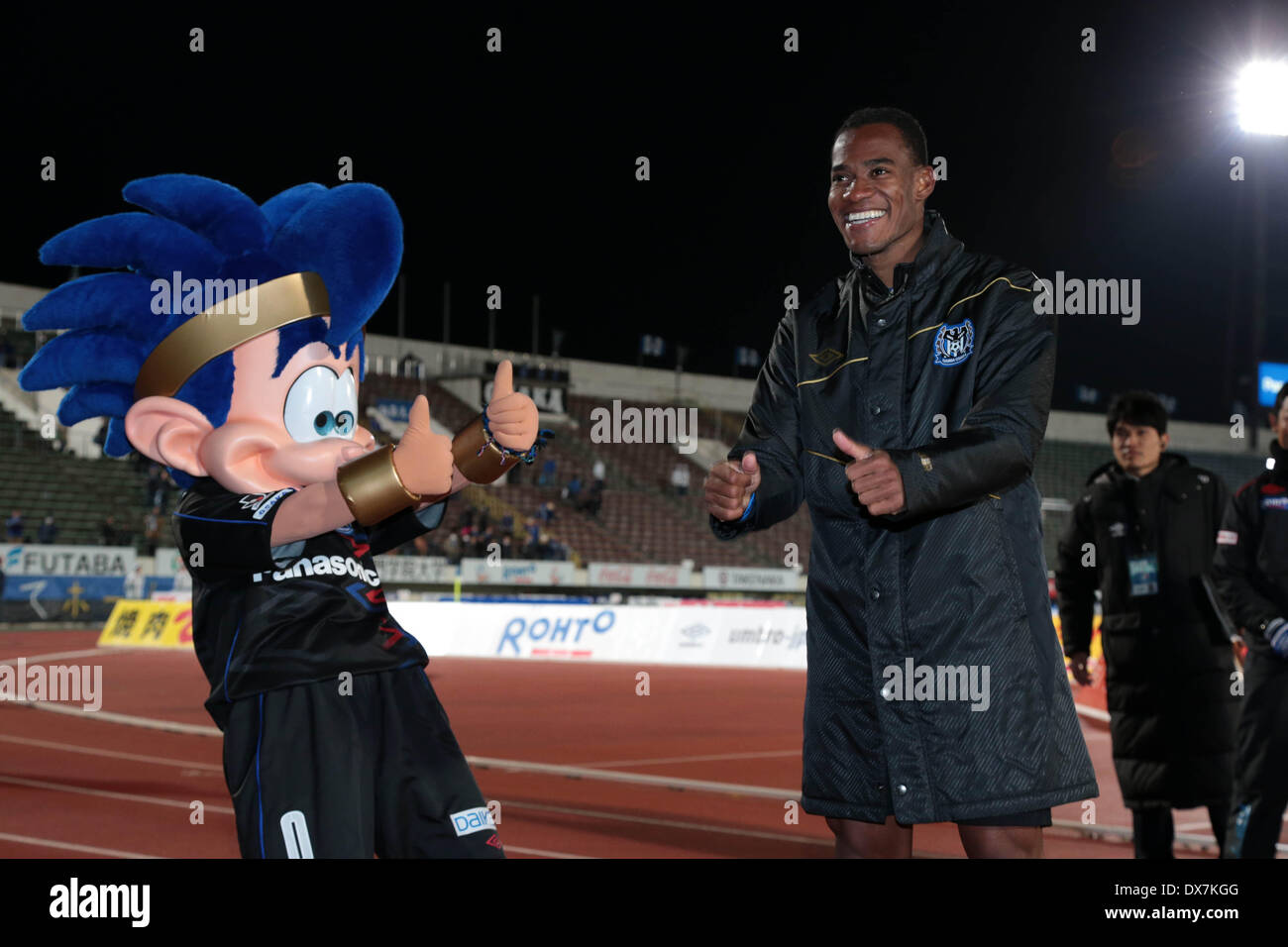 Osaka, Japan. 19th Mar, 2014. (L-R) Gamba Boy, Lins (Gamba) Football ...