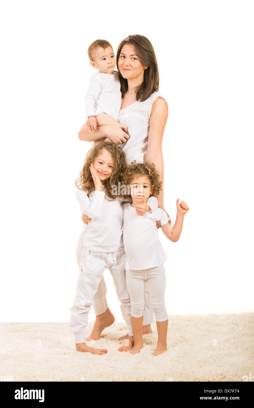 Portrait four happy family members hi-res stock photography and images ...