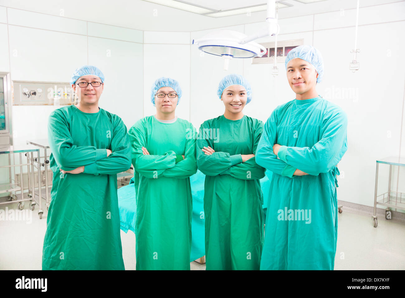 professional surgeon teams standing in a surgical room Stock Photo - Alamy