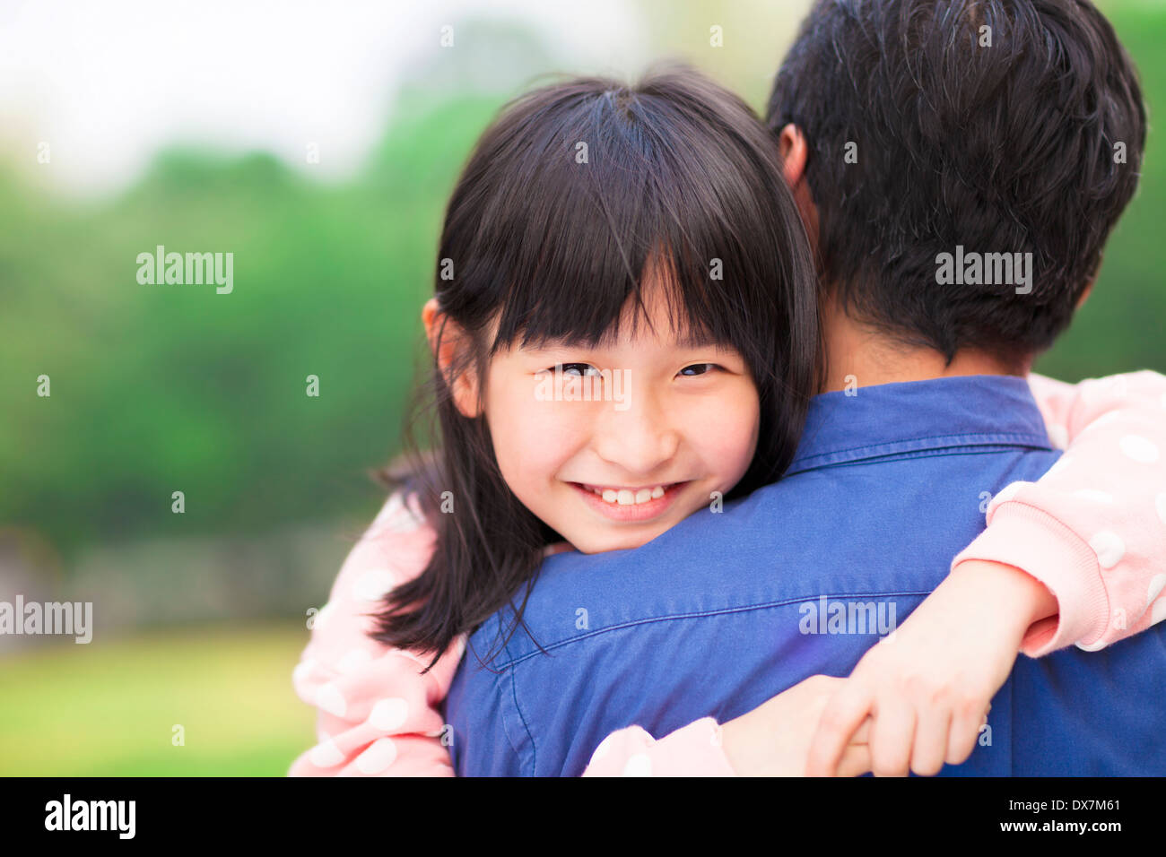 Girl hugging her father hi-res stock photography and images - Alamy