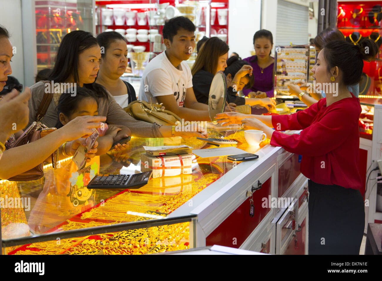 Buying gold in a department store in Vientiane, Laos Stock Photo - Alamy
