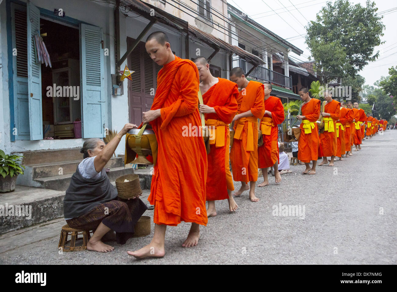 Tak bat almsgiving hi-res stock photography and images - Alamy