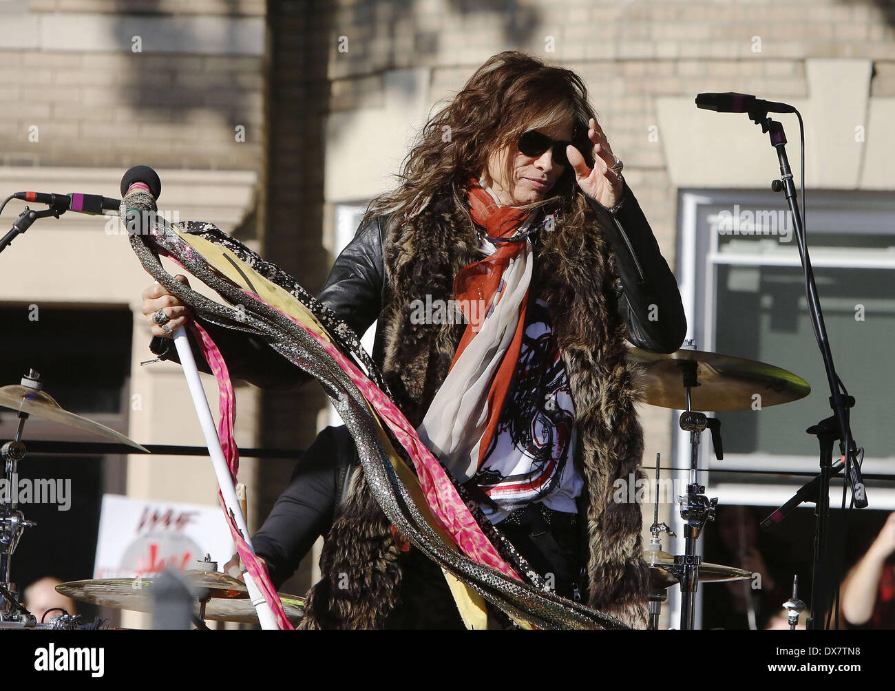 Aerosmith's Steven Tyler performs in front of 1325 Commonwealth Ave ...