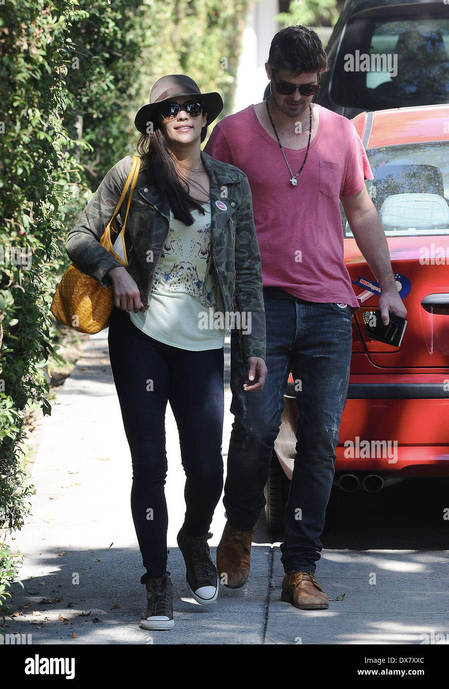 Robin Thicke and wife Paula Patton arriving at the voting polling ...