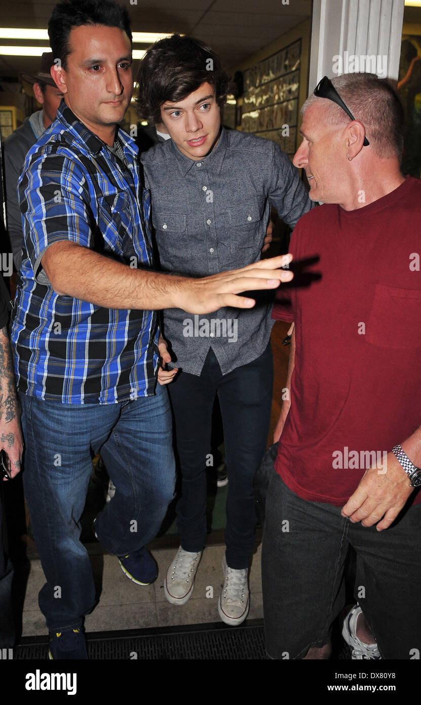 One Direction's Harry Styles is mobbed by fans outside the Shamrock ...