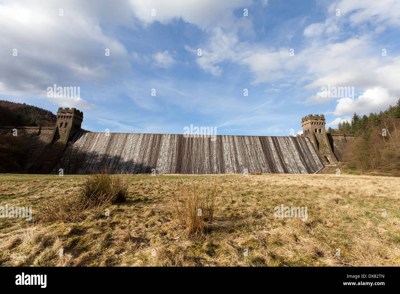 Water flowing over the top of Derwent Dam in the Peak District National ...