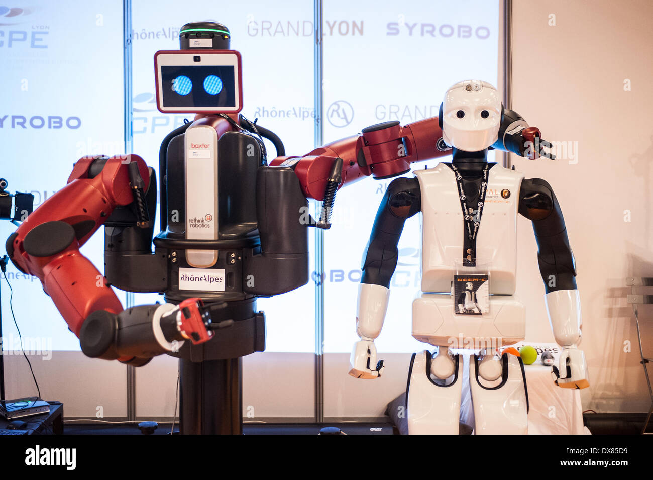 Lyon, France. 19th Mar, 2014. Baxter by Rethink Robotics and REEM-C by ...