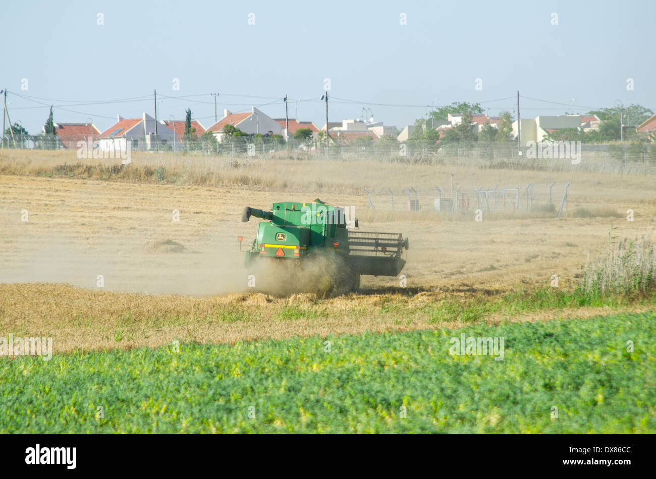 John Deere Combine harvester wheat Harvesting close up Stock Photo - Alamy